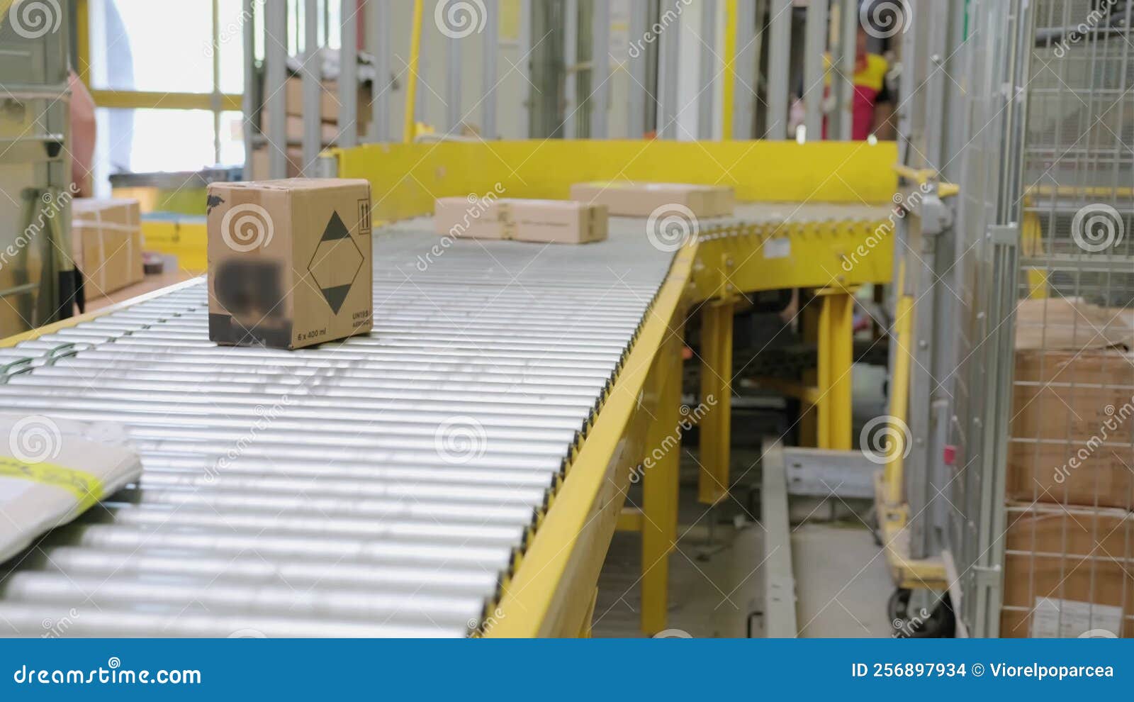 Household Appliance in Cardboard Boxes on Conveyor Roller in ...