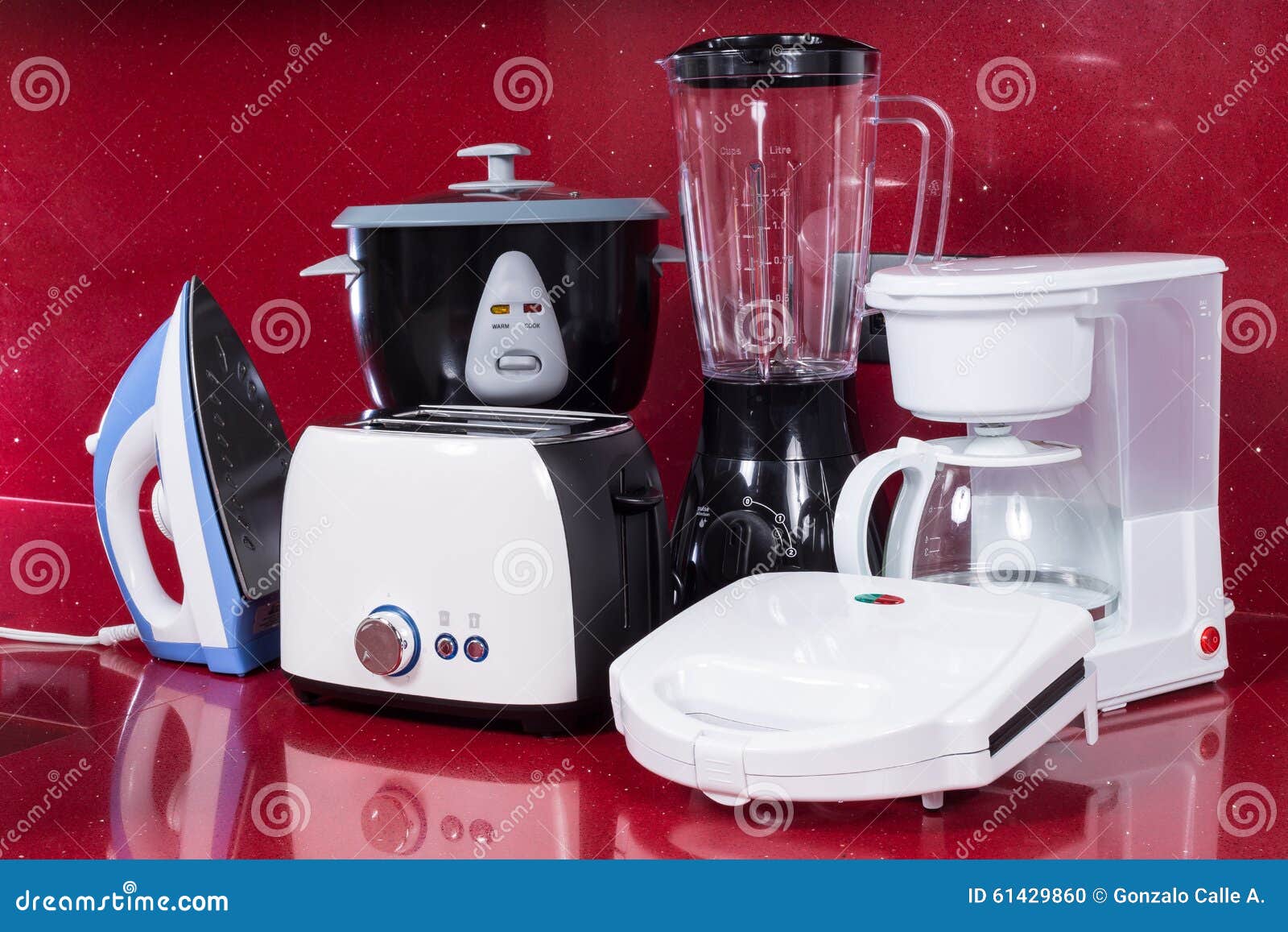 Household Appliances in Modern Kitchen Red Background Stock Photo ...