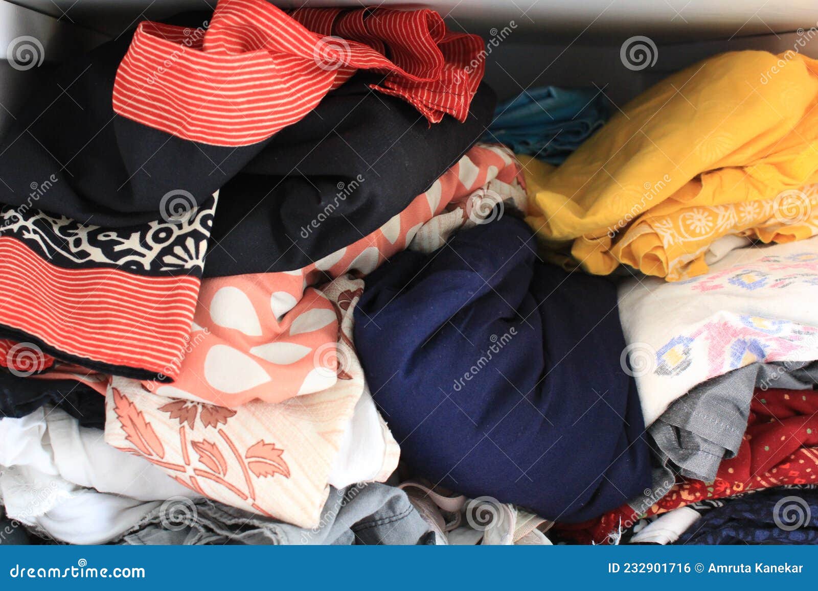 Household Clutter and Clothes Stock Photo - Image of fabrics, clutter ...