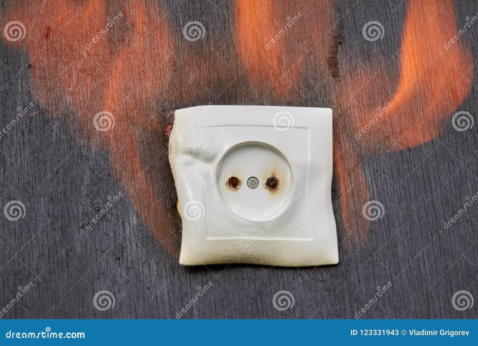 Defective Wiring Causes A Fire. Burning Electrical Wiring And Socket ...