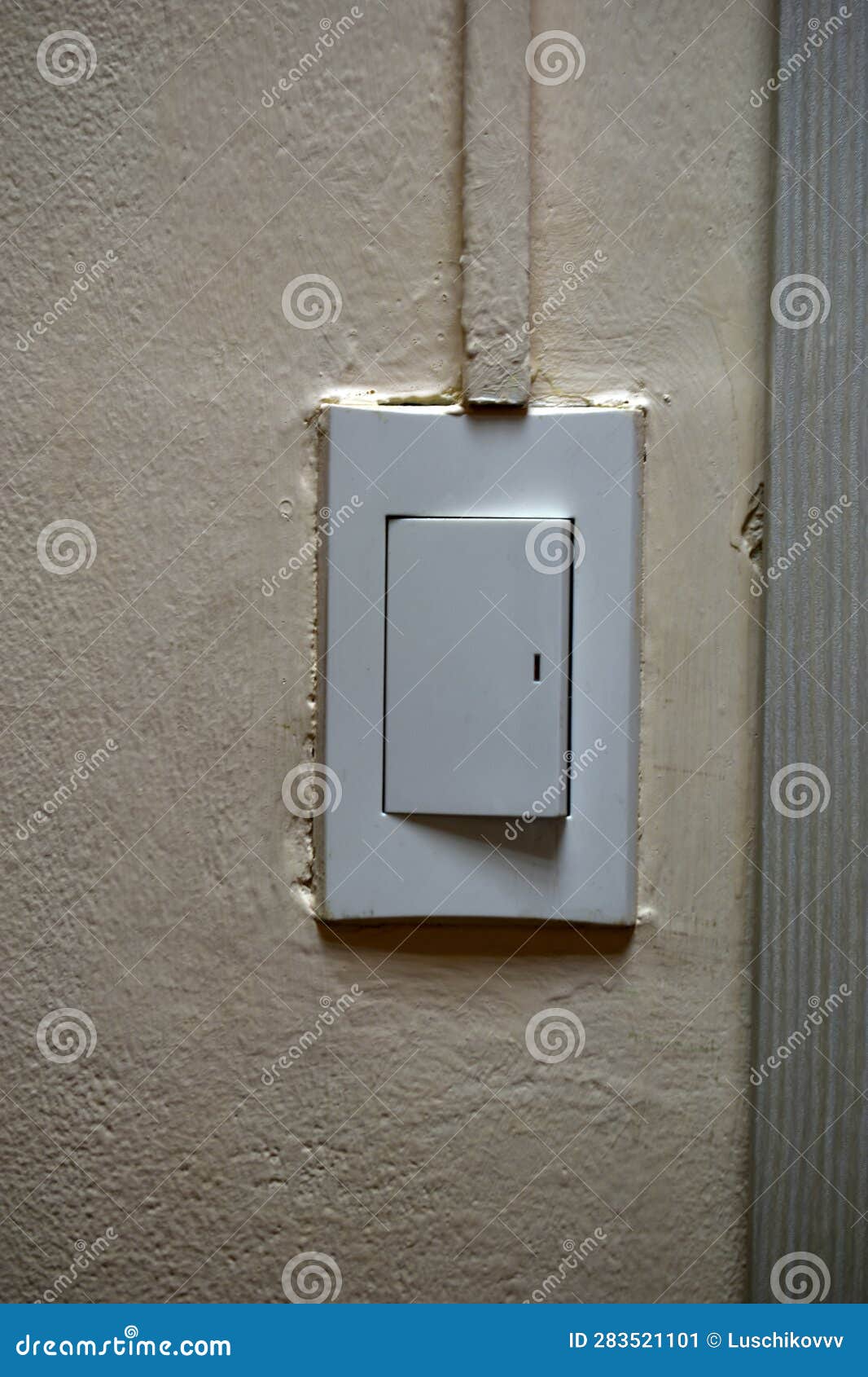Household Light Switch on the Wall. White Plastic Switch Stock Image ...