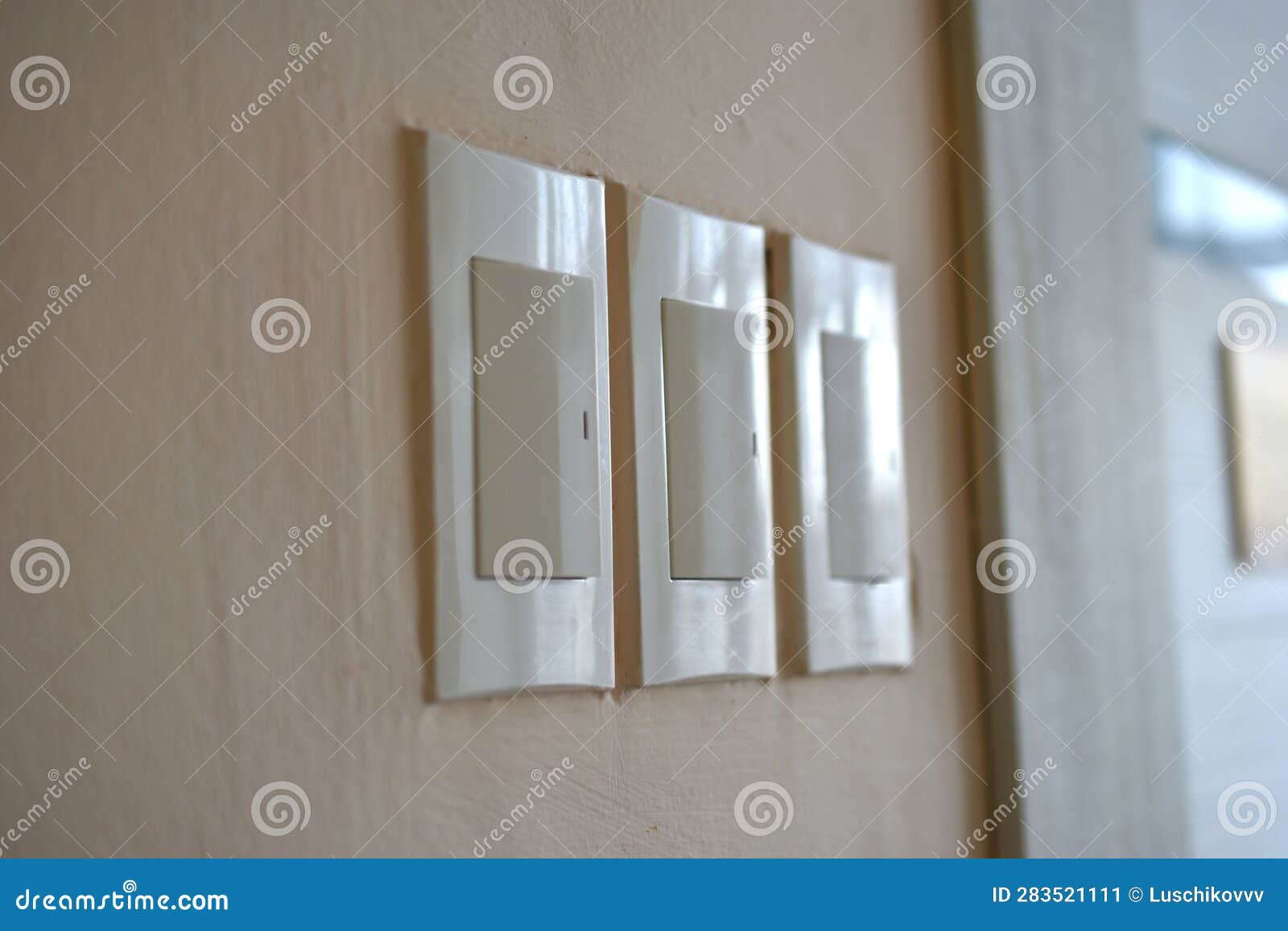 Household Light Switch on the Wall. White Plastic Switch Stock Image ...