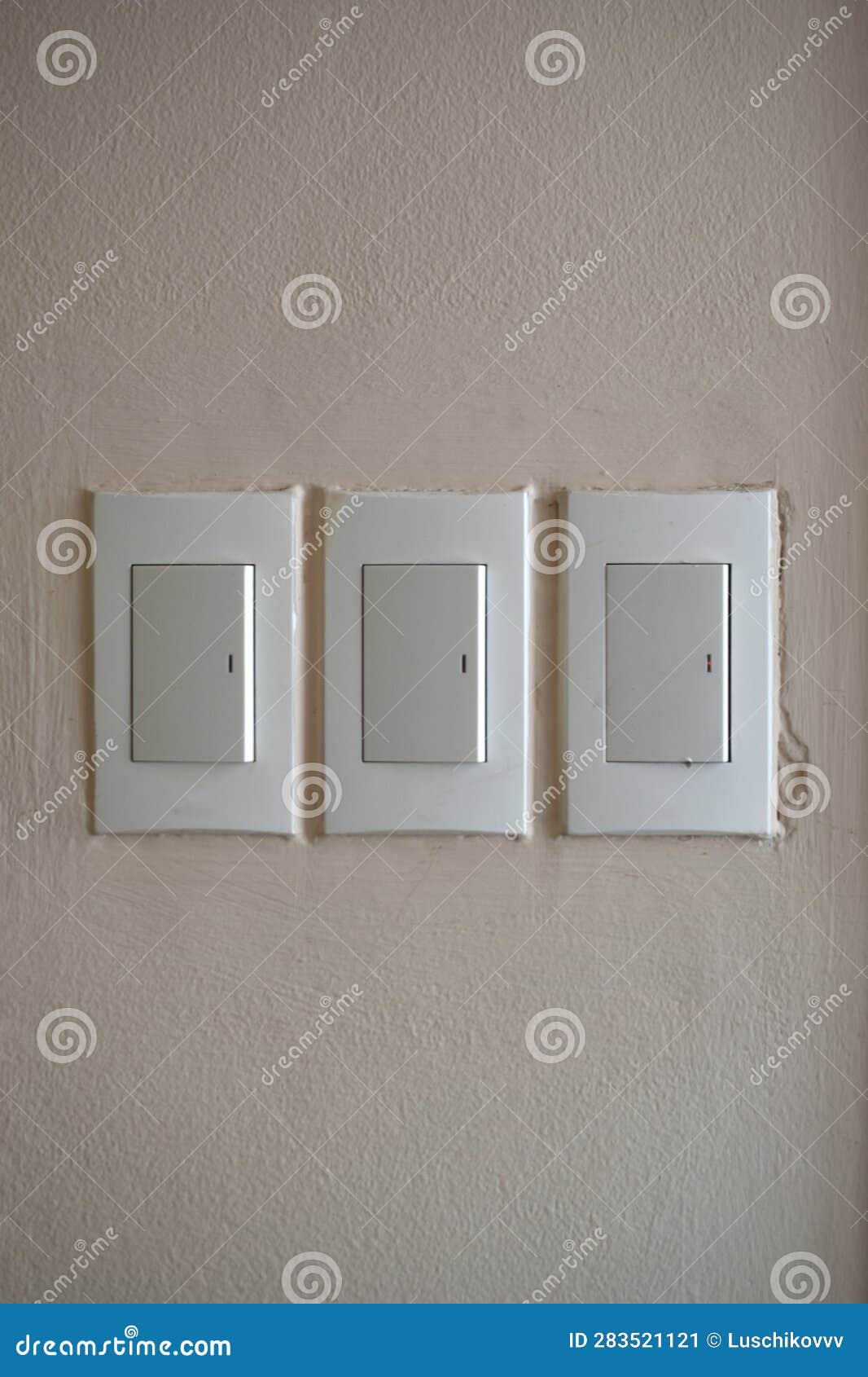 Household Light Switch on the Wall. White Plastic Switch Stock Image ...