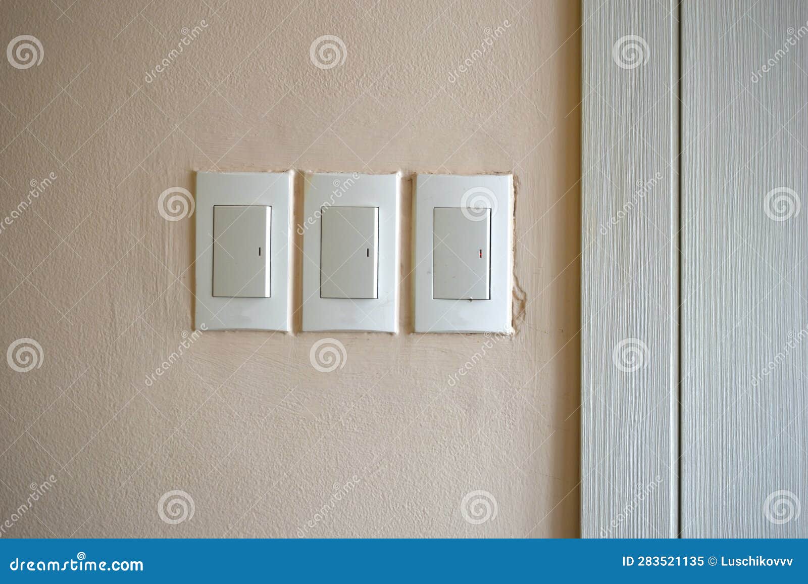 Household Light Switch on the Wall. White Plastic Switch Stock Image ...