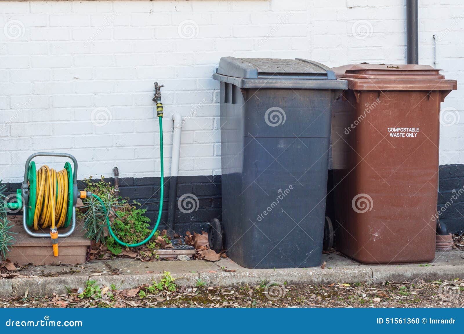 Household Plastic Recycling Bins Against a Wall Stock Photo - Image of ...