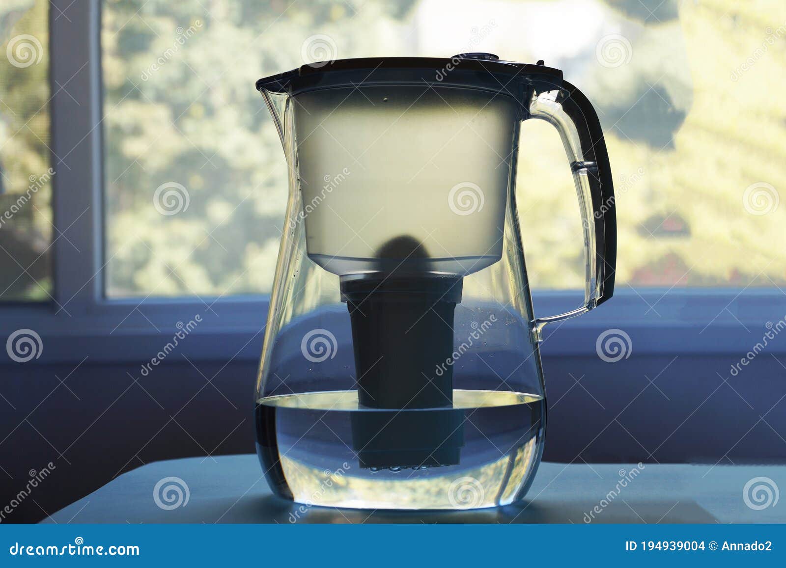 Household Water Purifier on a Window Background Stock Photo - Image of ...