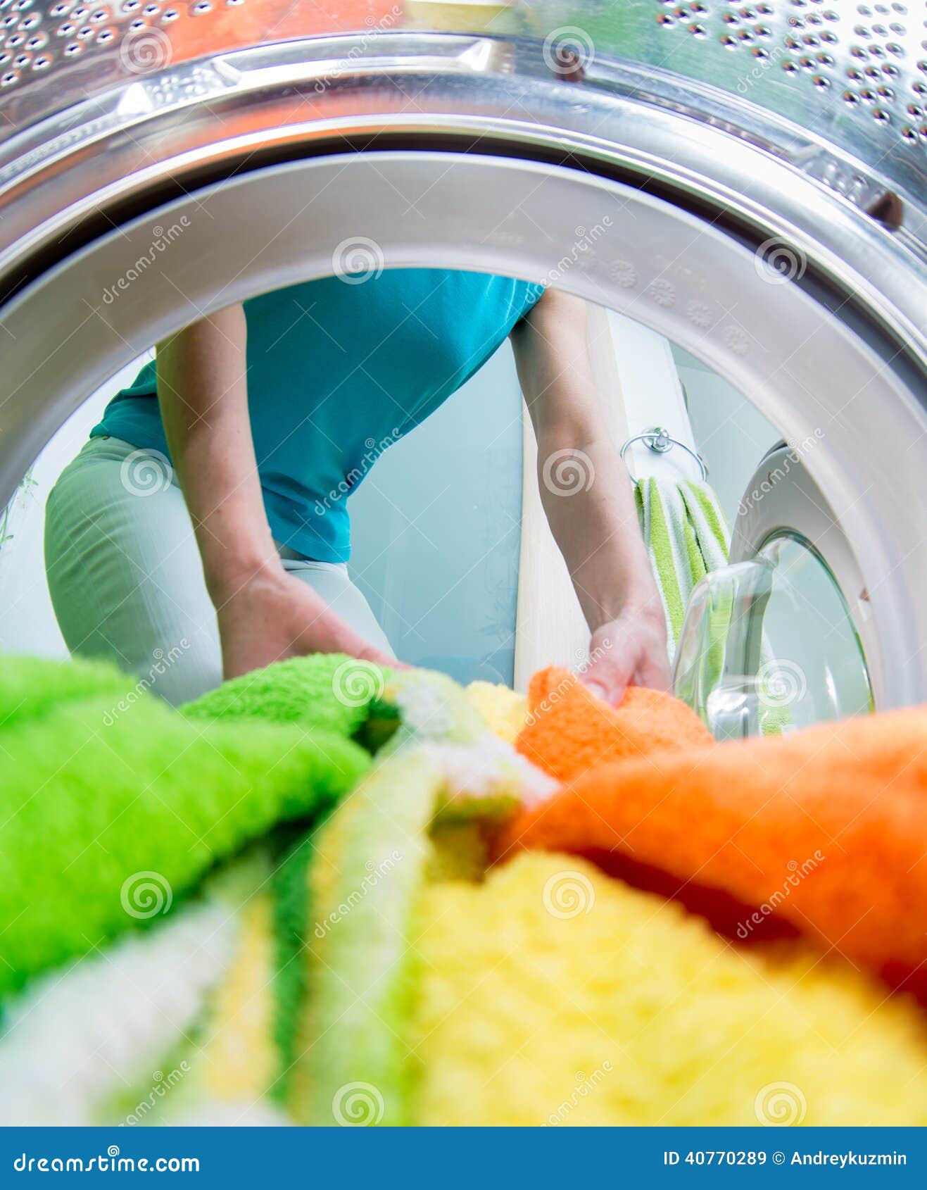 Householder Loading Clothing into Washing Machine Stock Image - Image ...
