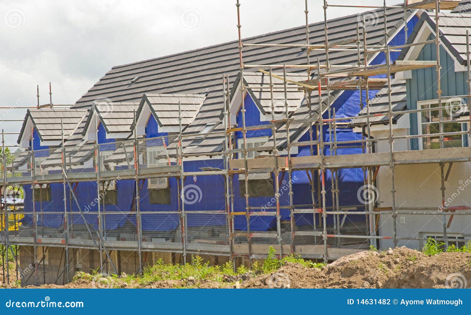 Houses Under Construction with Thermal Lagging. Stock Photo - Image of ...
