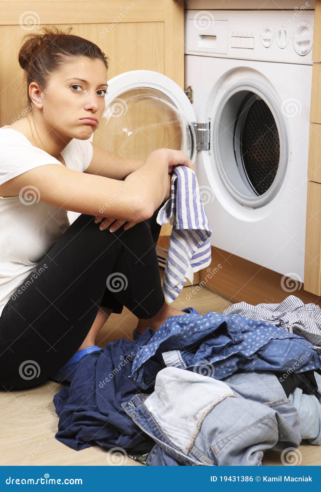Housewife doing laundry stock photo. Image of caucasian - 19431386