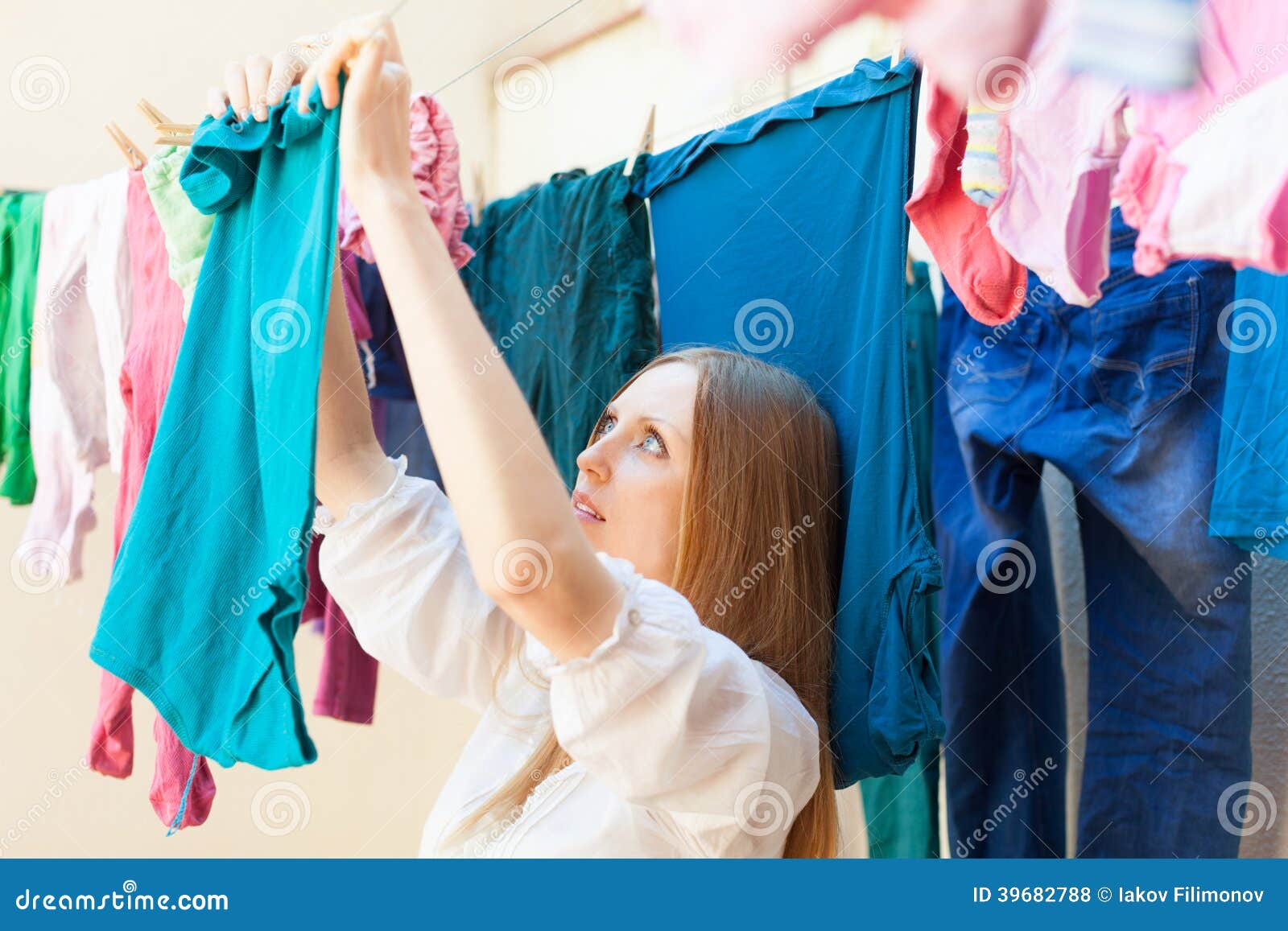 Housewife Drying Clothes on Clothes-line Stock Photo - Image of clean ...