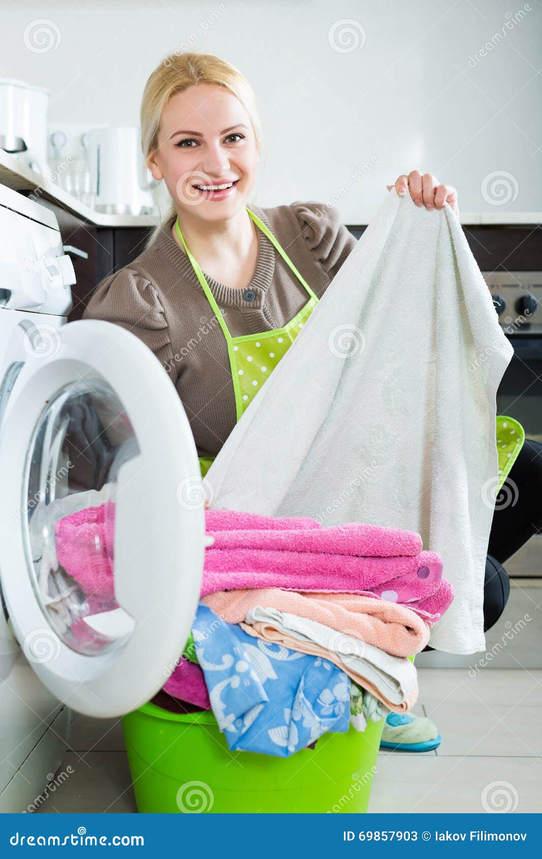 Housewife Using Washing Machine Stock Image - Image of smiling, casual ...
