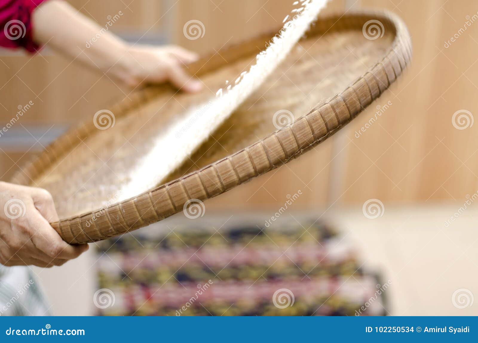 Housewife Winnowing Rice by Using Bamboo Basketwork for Separate ...