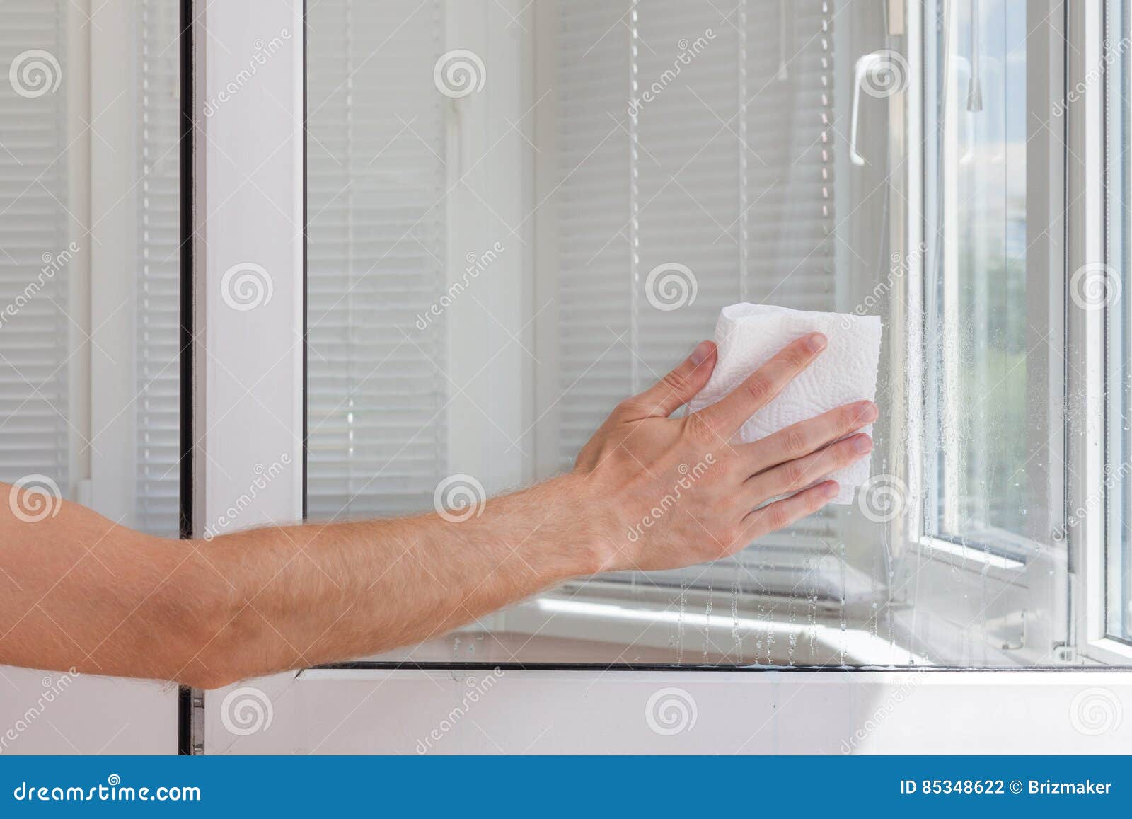 Houseworker Clean Plastic Pvc Window with Napkin. Stock Photo - Image ...