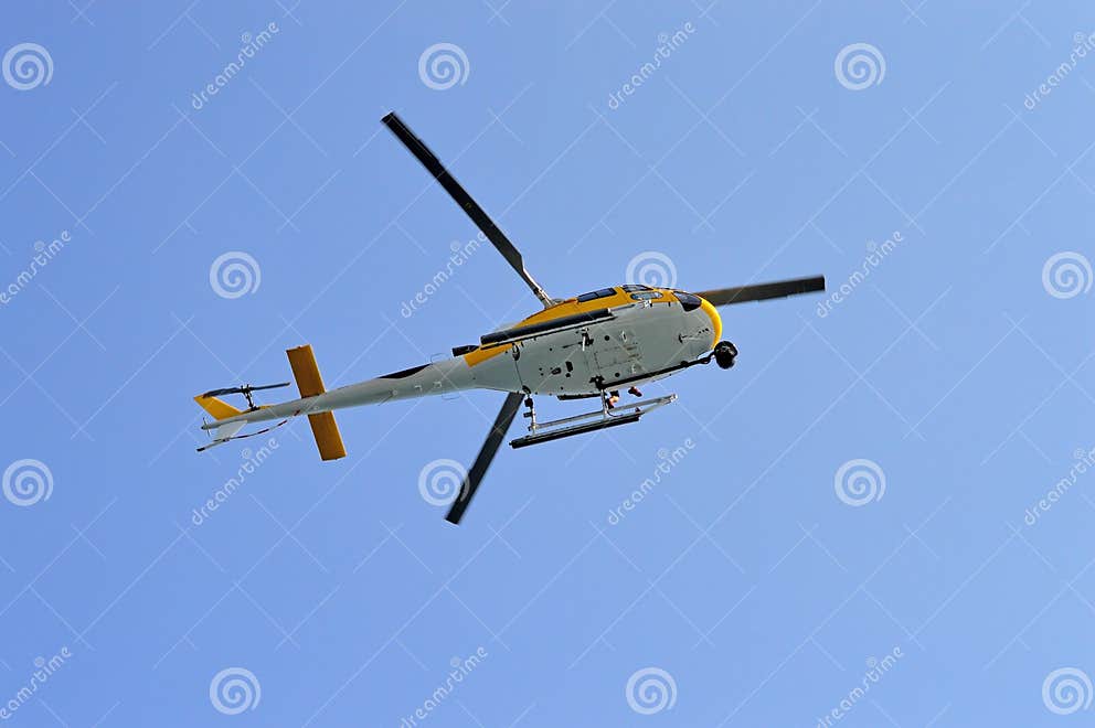 Hovering Helicopter stock image. Image of feet, industry - 45244301