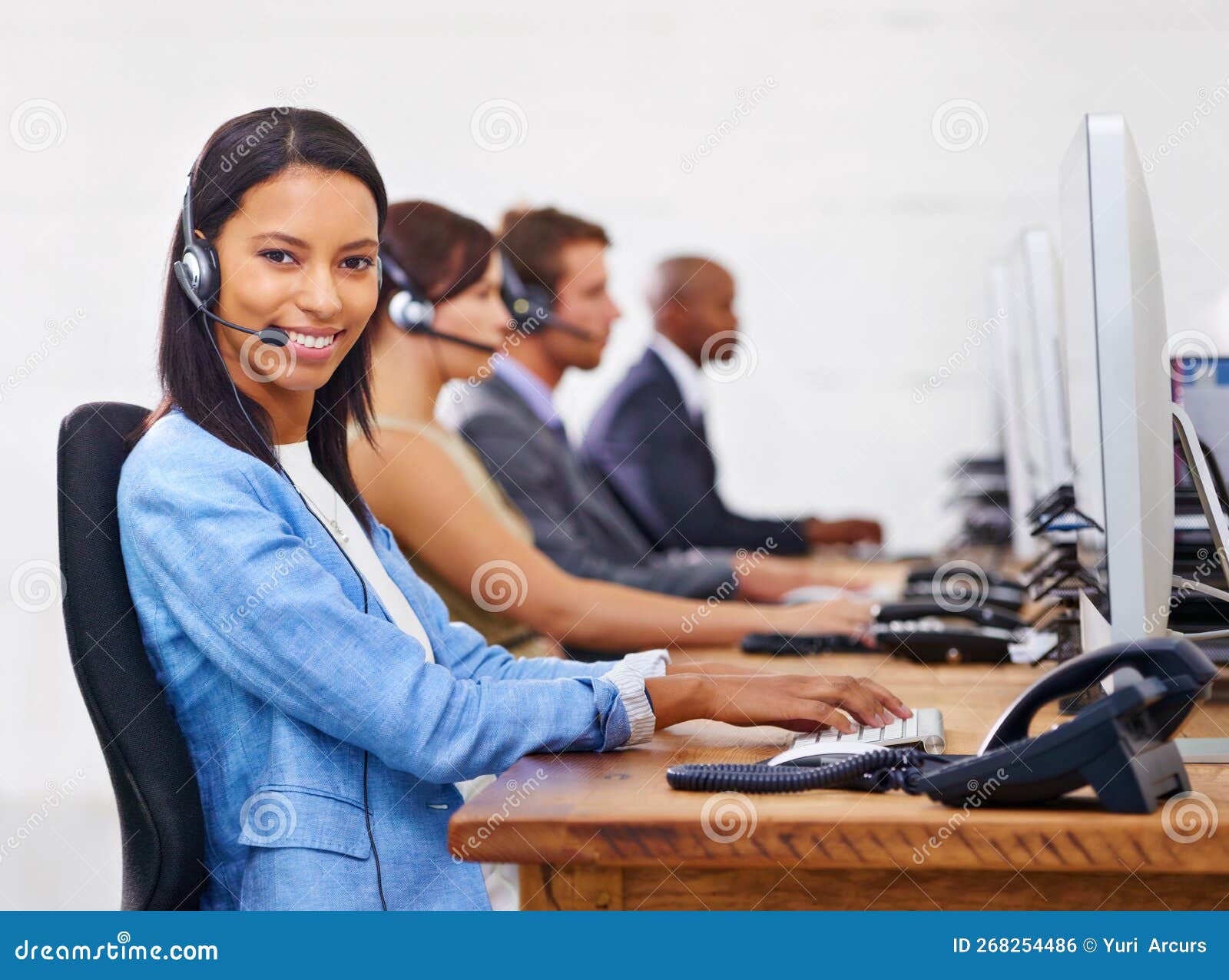 How Can we Help You. Customer Service Representatives in a Call Center ...