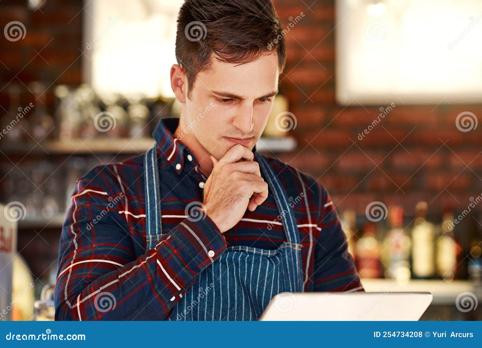 How Can I Attract More Customers. a Restaurant Owner Using a Digital ...