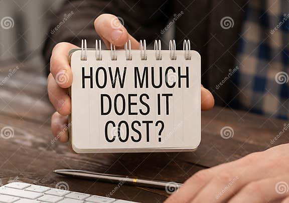 How Much Does it Cost Text Written in the Notebook in Hand. Stock Image ...