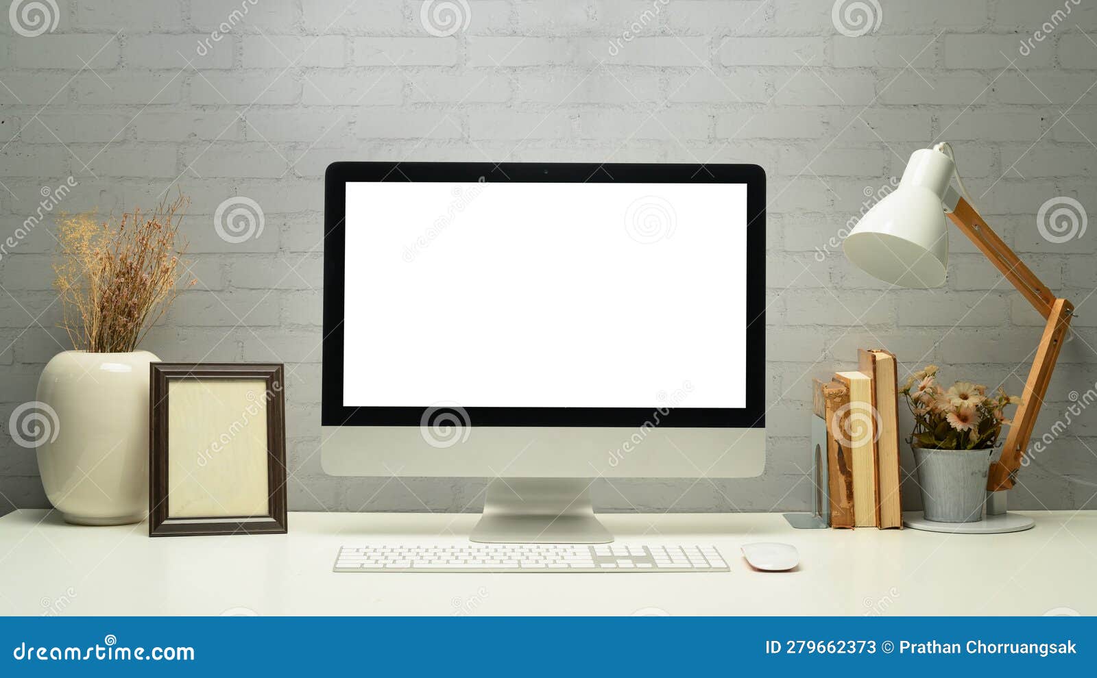 How Office Desk with Blank Screen Computer, Picture Frame and Books ...