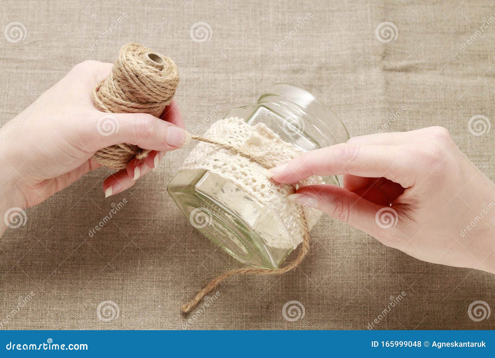 How To Make Glass Jar Decorated with Lace and String Stock Photo ...