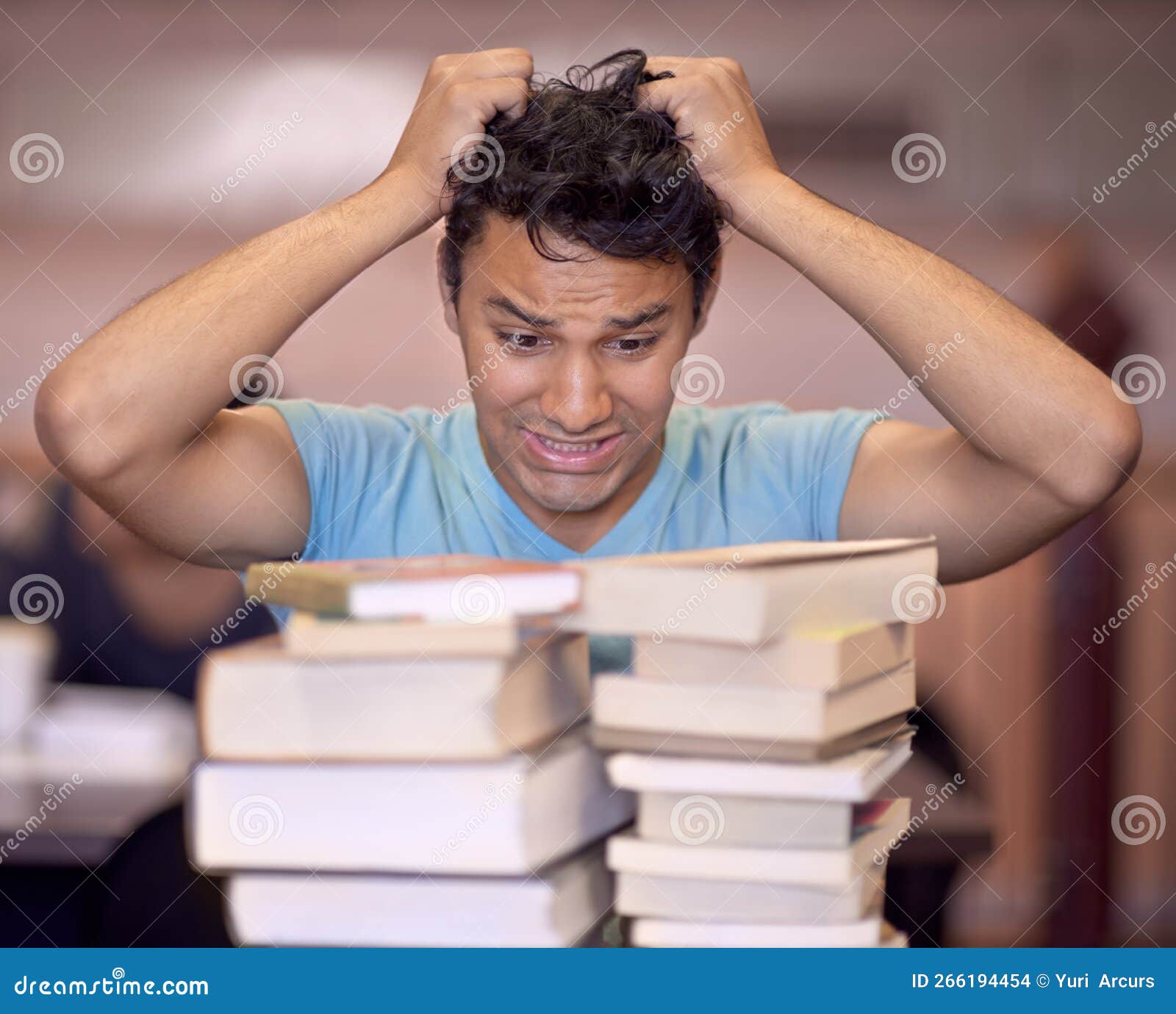 How Will I Get through All this Material. a Stressed Student Looking at ...