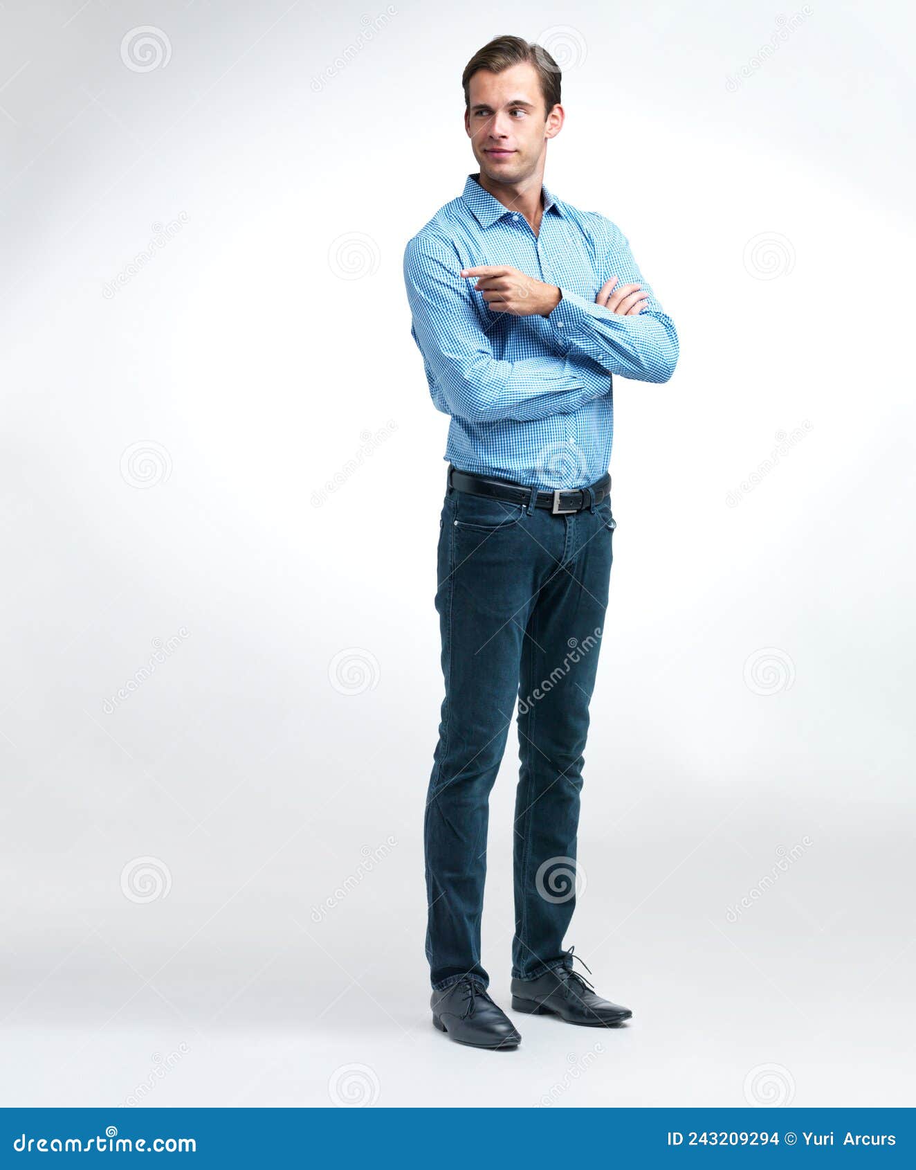 How You Doin. Shot of a Handsome Young Man Pointing Off Camera. Stock ...