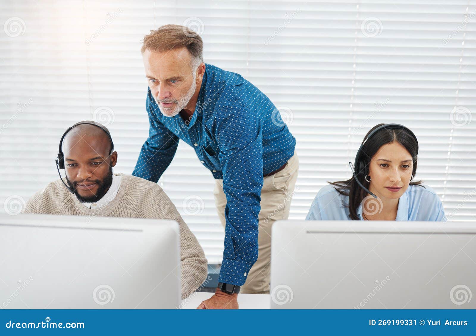 Hows it Going so Far. Two Call Centre Agents Sitting in the Office and ...