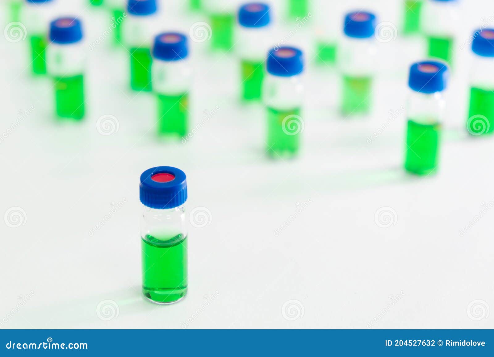 HPLC Vials with Green Sample of Plant Extracts. Developing of Drugs ... HPLC Vials with Green Sample of Plant Extracts. Developing of Drugs ...
