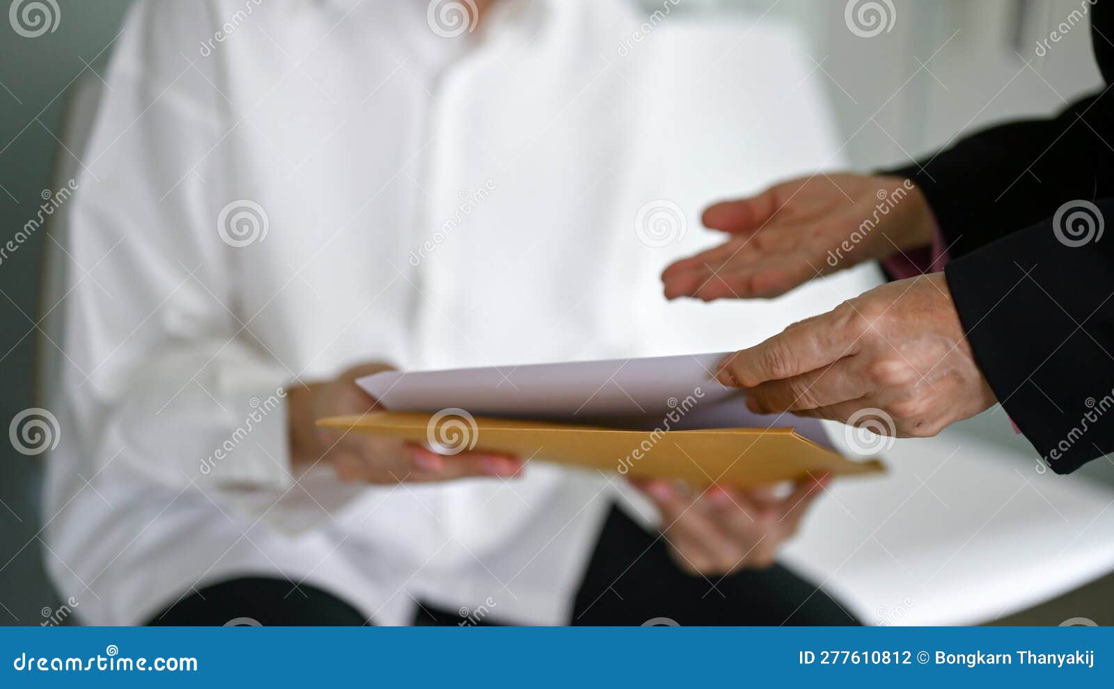 A HR Manager Checking Candidate S Documents before an Interview Stock ...