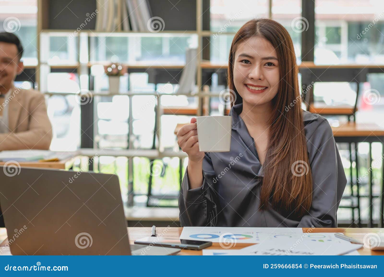 HR Workers Sit Back and Relax with Coffee on Their Desks with Their ...