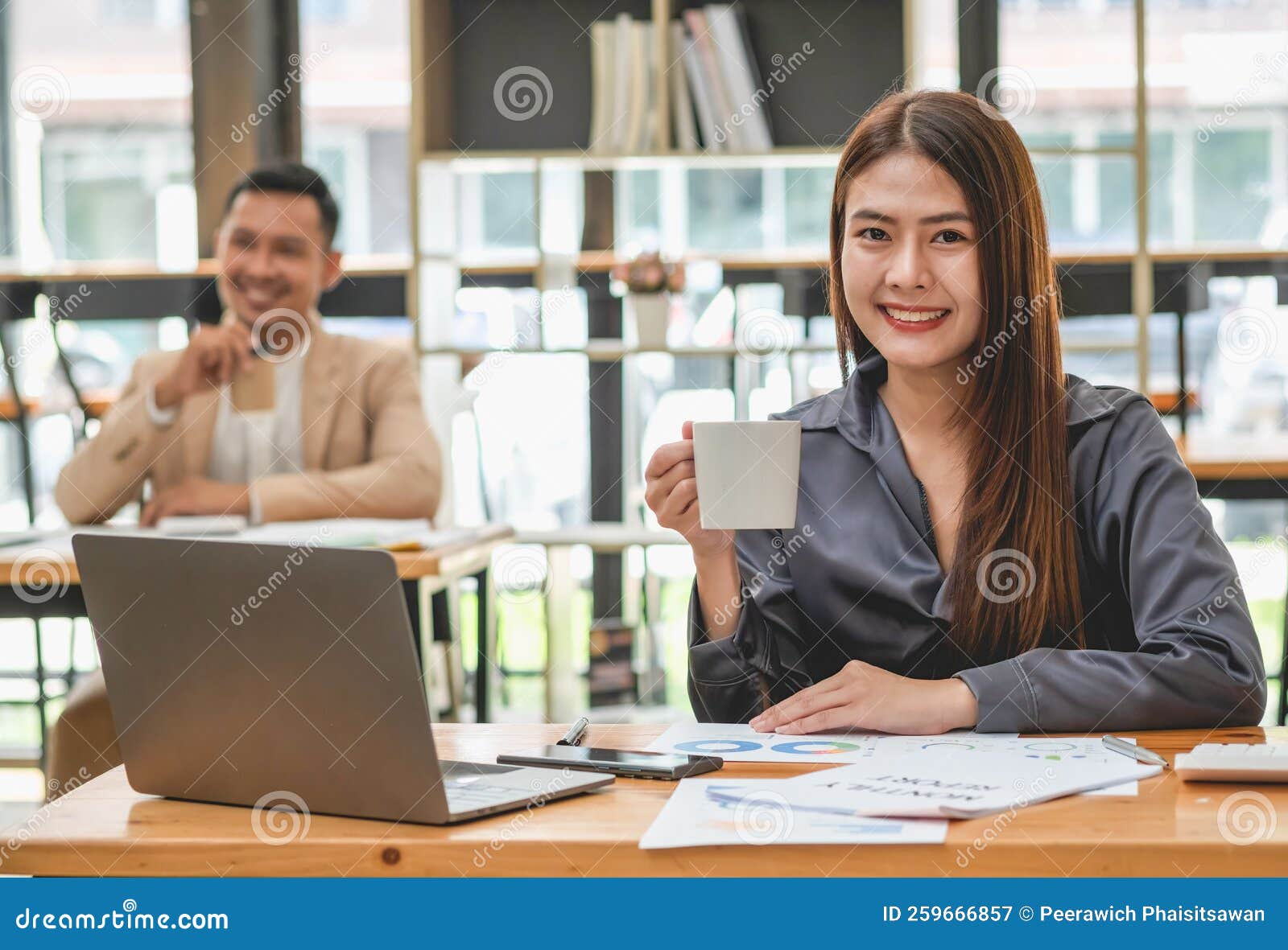 HR Workers Sit Back and Relax with Coffee on Their Desks with Their ...