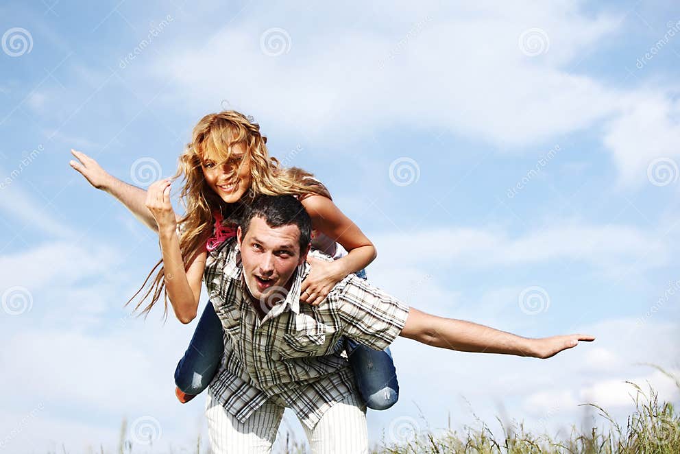 Hug in sky stock photo. Image of cheerful, friendship - 20923774