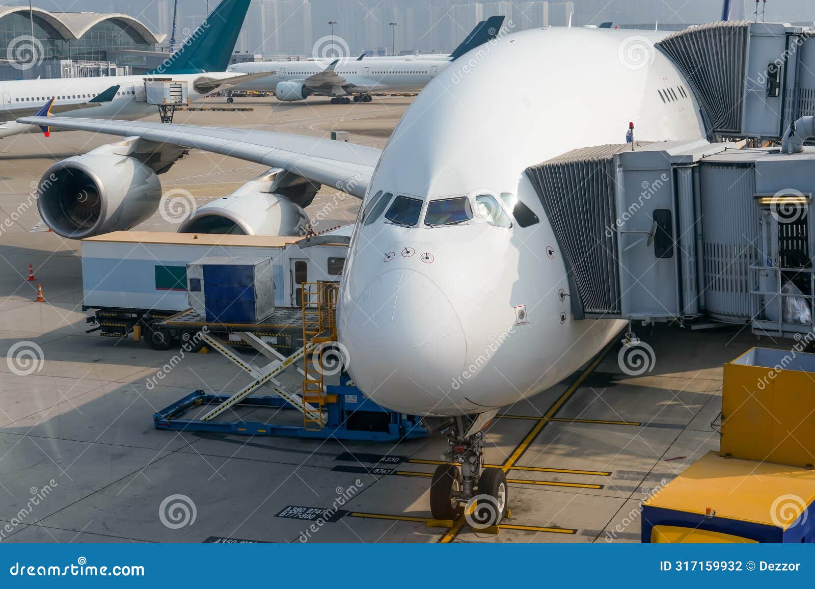 Huge Airplane Jet Connected To Terminal Via Jet Bridge Stock Photo ...