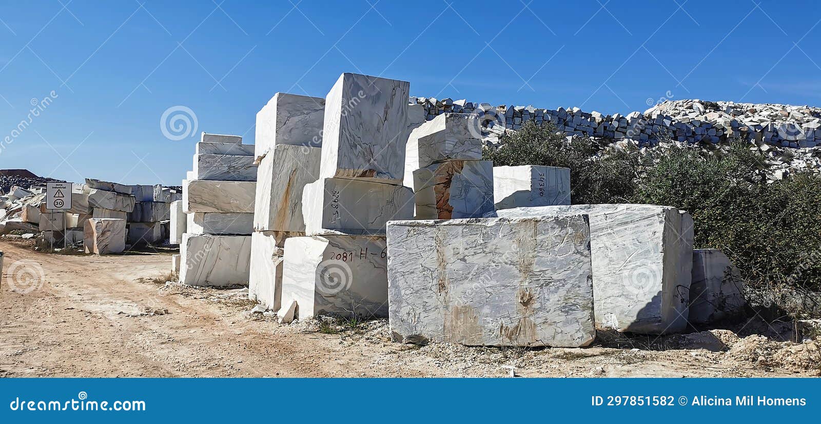 Huge Blocks of Stone in an Operating Quarry Stock Photo - Image of pond ...