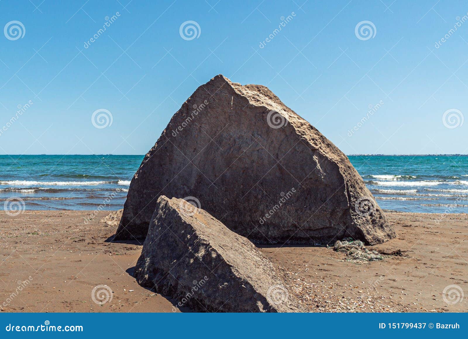 Huge boulder on beach stock image. Image of sandy, clean - 151799437