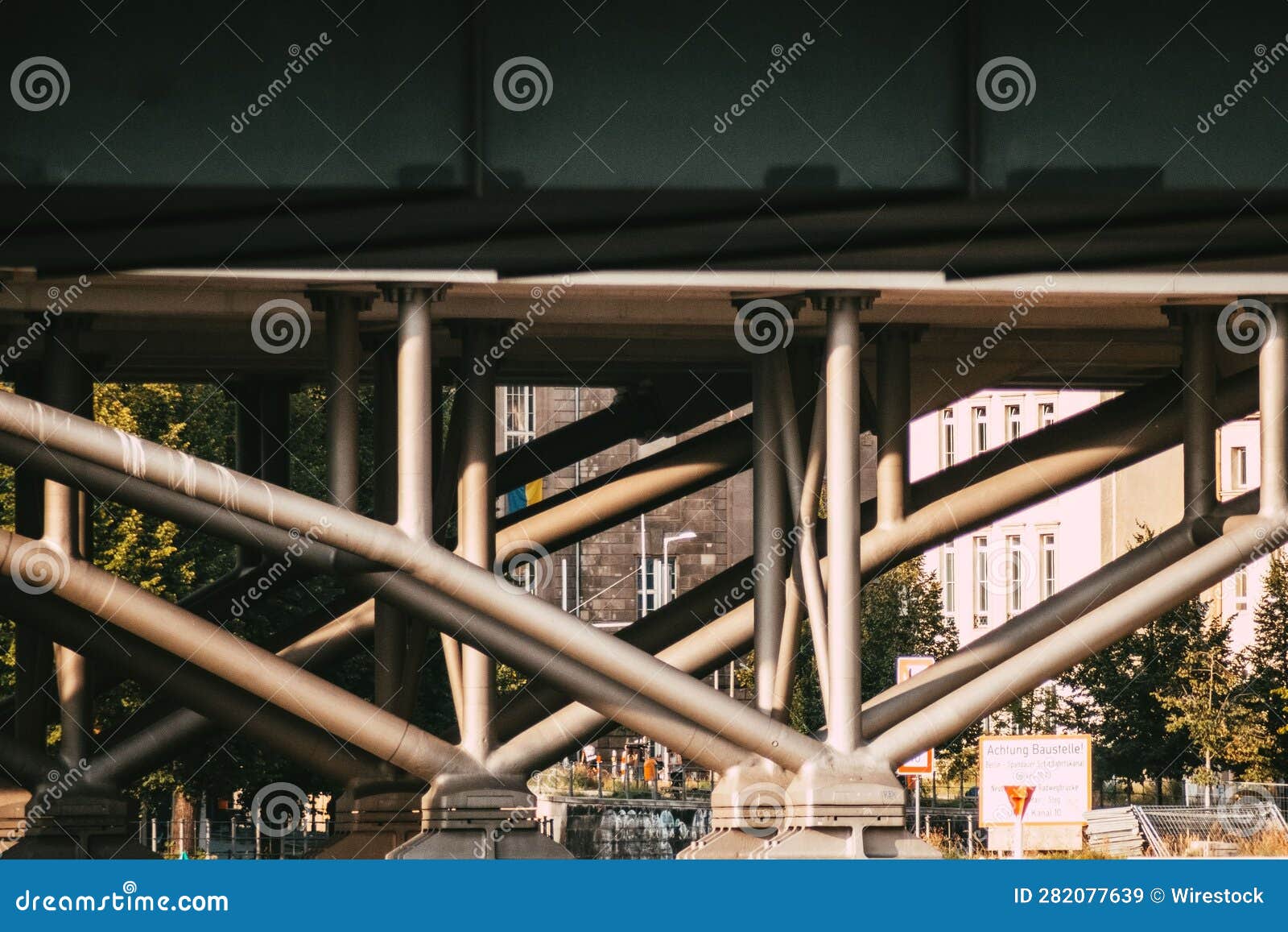 Huge Bridge with Big Pipelines in a Bustling City in Daylight Stock ...
