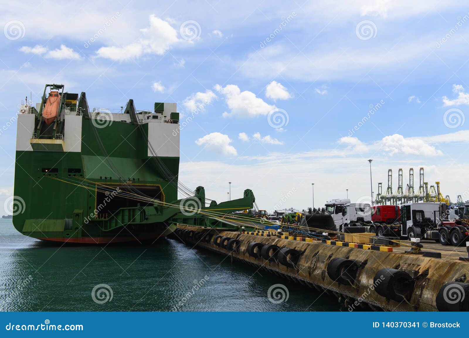 Huge Container Cargo Ship on Harbor while Load Car into it Stock Image ...