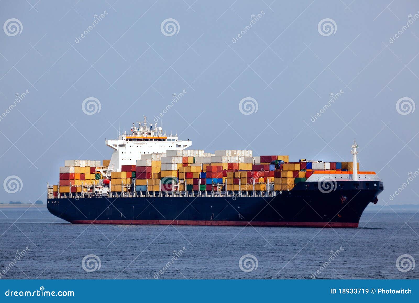 Container Ship And Commercial Dock Load And Unloading Cargo From ...