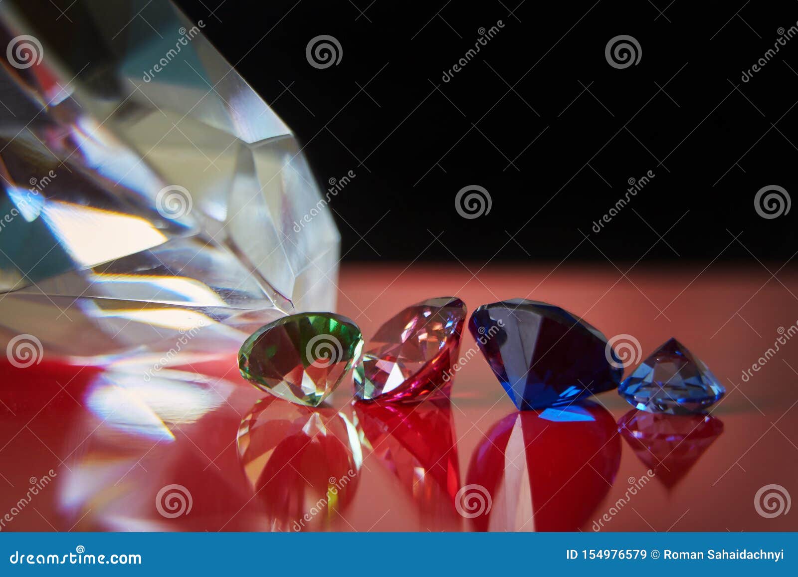Huge Diamond and Several Chic Crystals on a Red and Black Surface ...