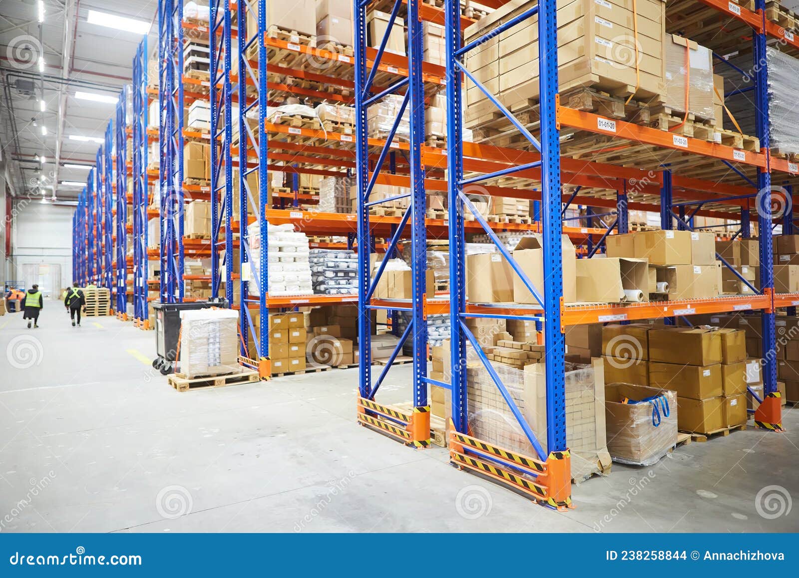 Huge Distribution Warehouse with High Shelves and Loaders. Stock Photo ...