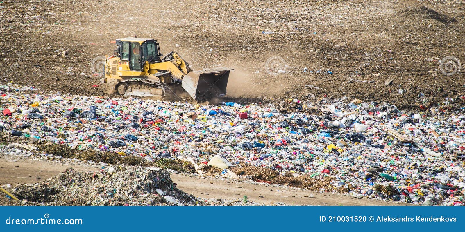 Yellow Tractor Works on Huge Landfill of Big City. a Lot of Garbage on ...