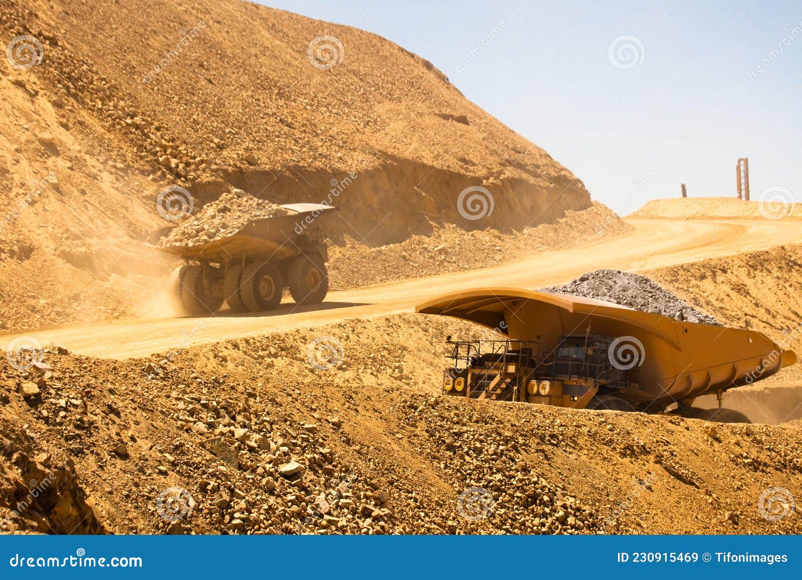 Huge Dump Trucks In An Open Pit Copper Mine Stock Photography ...