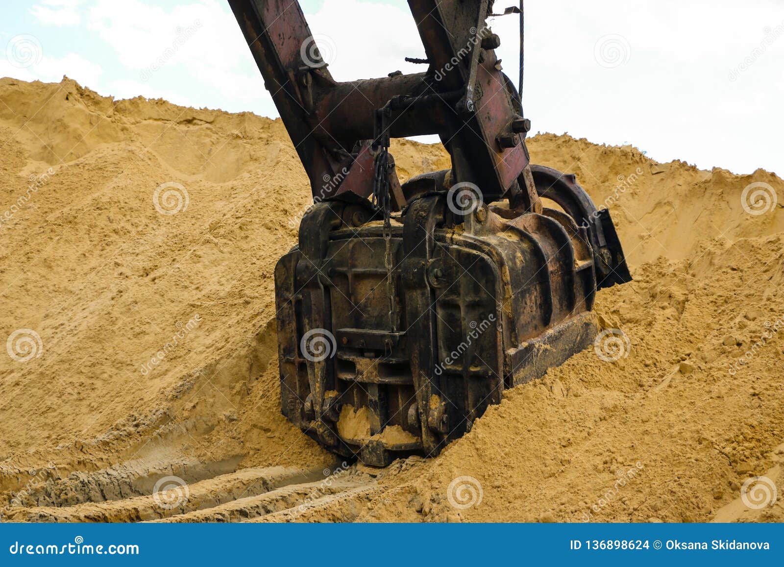 Huge Excavator Bucket Digs Sand in Sand Quarry Mining Stock Photo ...