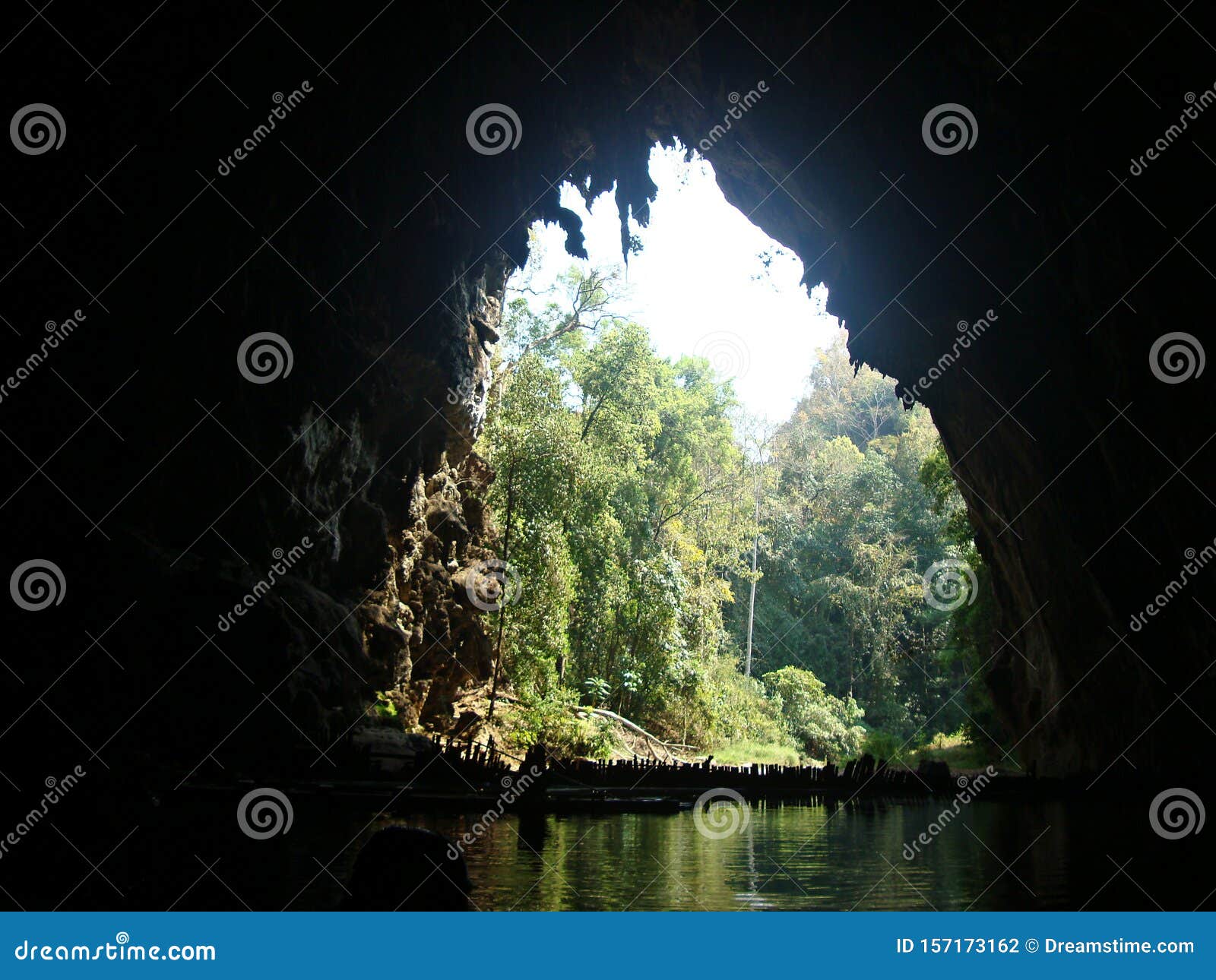 Huge exit from the cave stock photo. Image of pinkyellow - 157173162