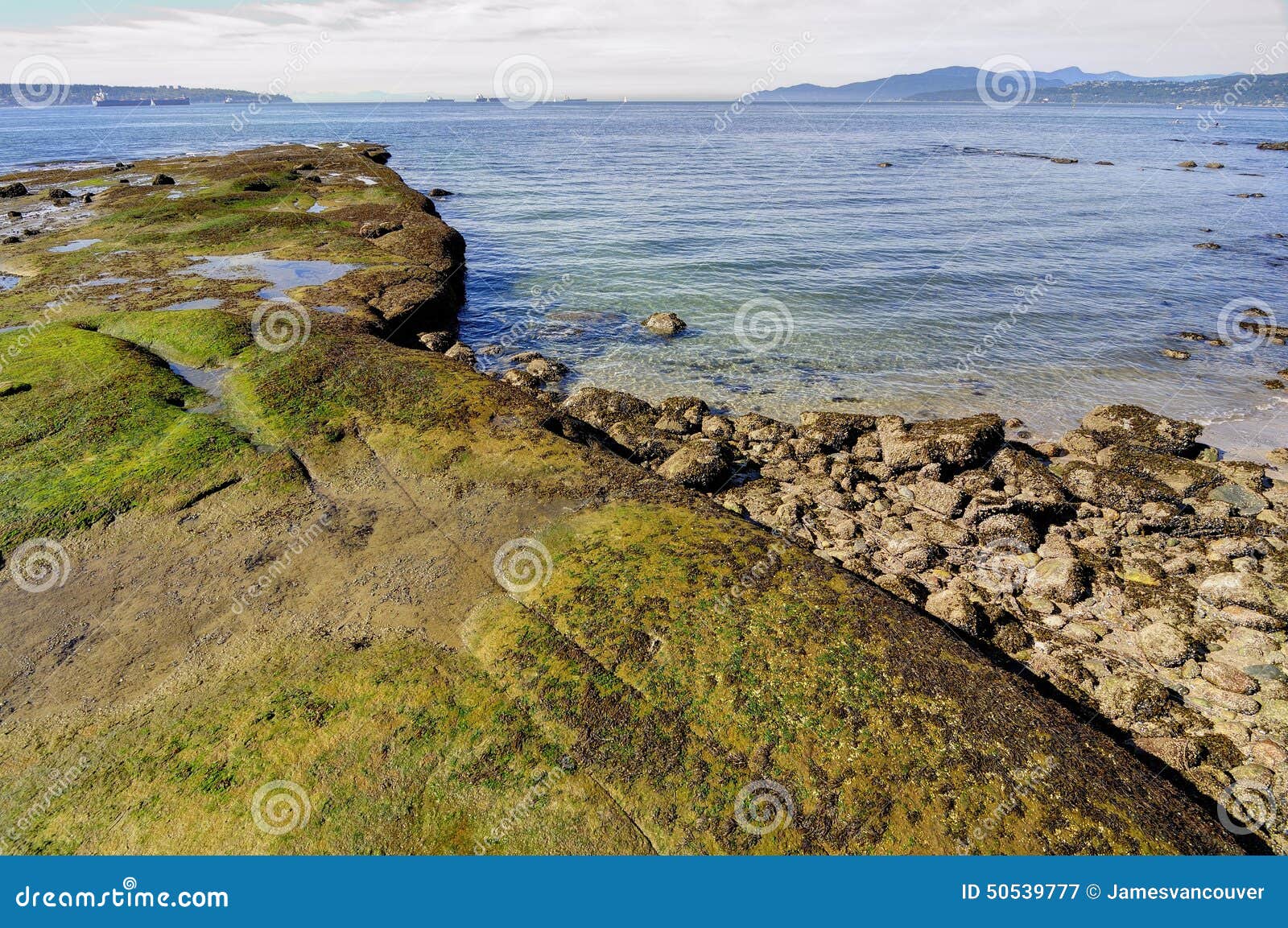 Huge Flat Rock on the Beach Stock Image - Image of sailboat ...