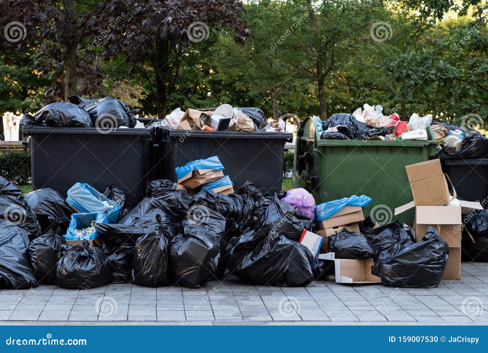 Huge Garbage Piles Next To the Dumpster after City Fair. Stacks of ... Huge Garbage Piles Next To the Dumpster after City Fair. Stacks of ...