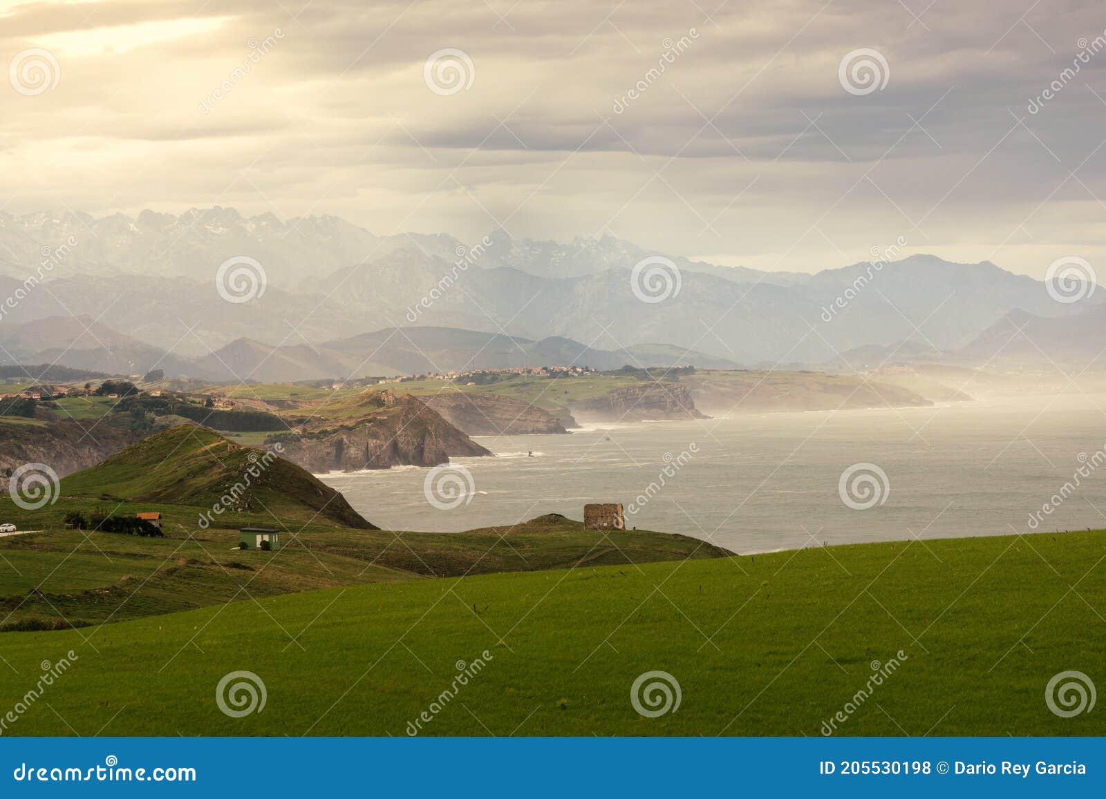 Huge Green Grass Field and a Cliff Landscape Stock Photo - Image of ...