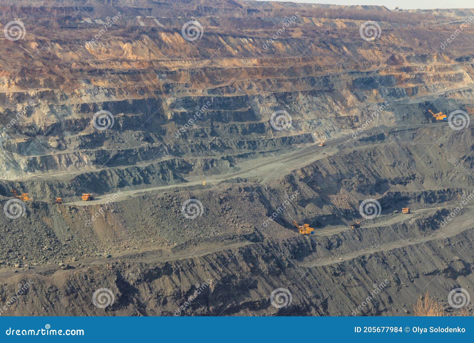 Huge Iron Ore Quarry with Working Dump Trucks and Excavators Stock ...