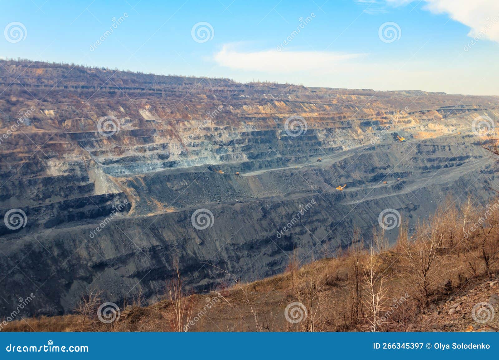 Huge Iron Ore Quarry with Working Dump Trucks and Excavators Stock ...