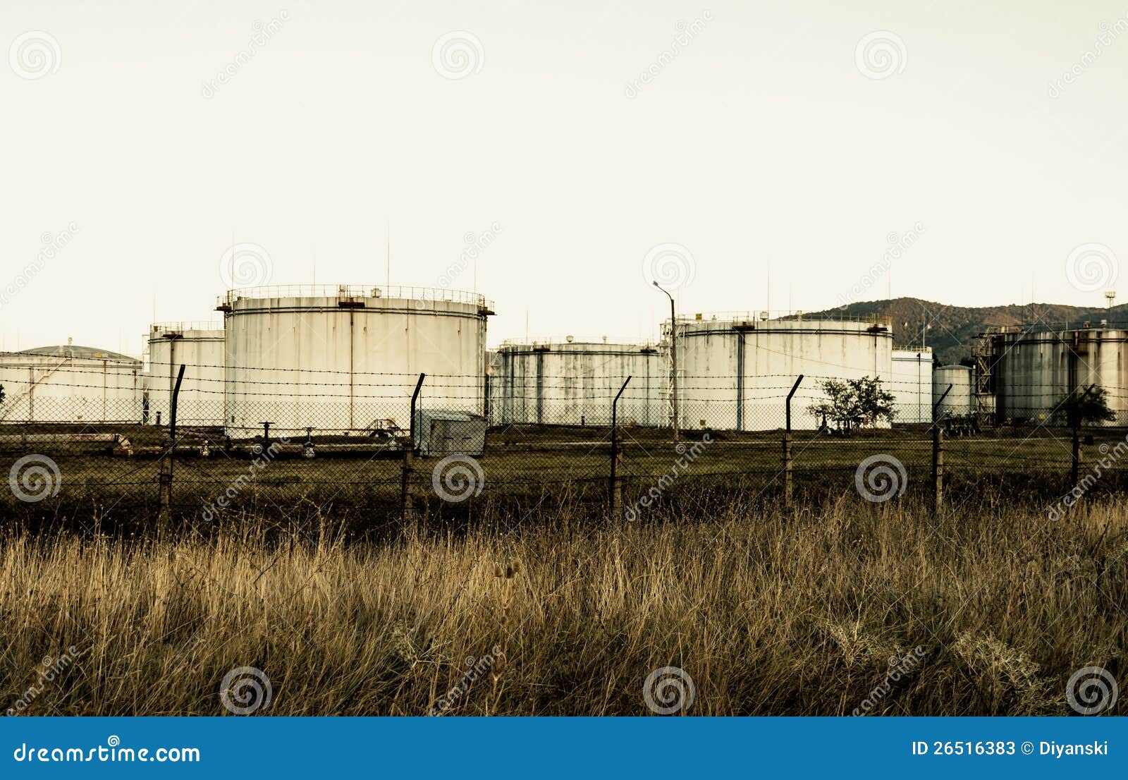 Huge old rusty fuel tanks stock image. Image of silo - 26516383