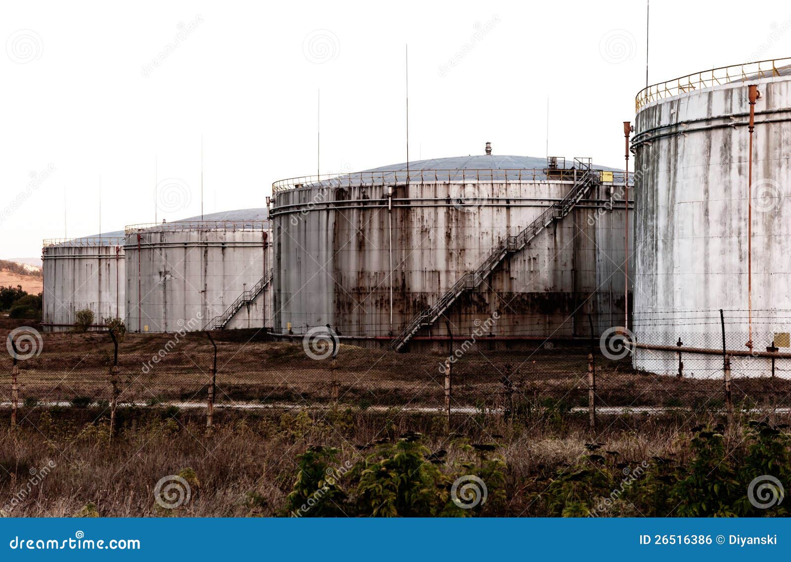 Huge old rusty fuel tanks stock photo. Image of silo - 26516386